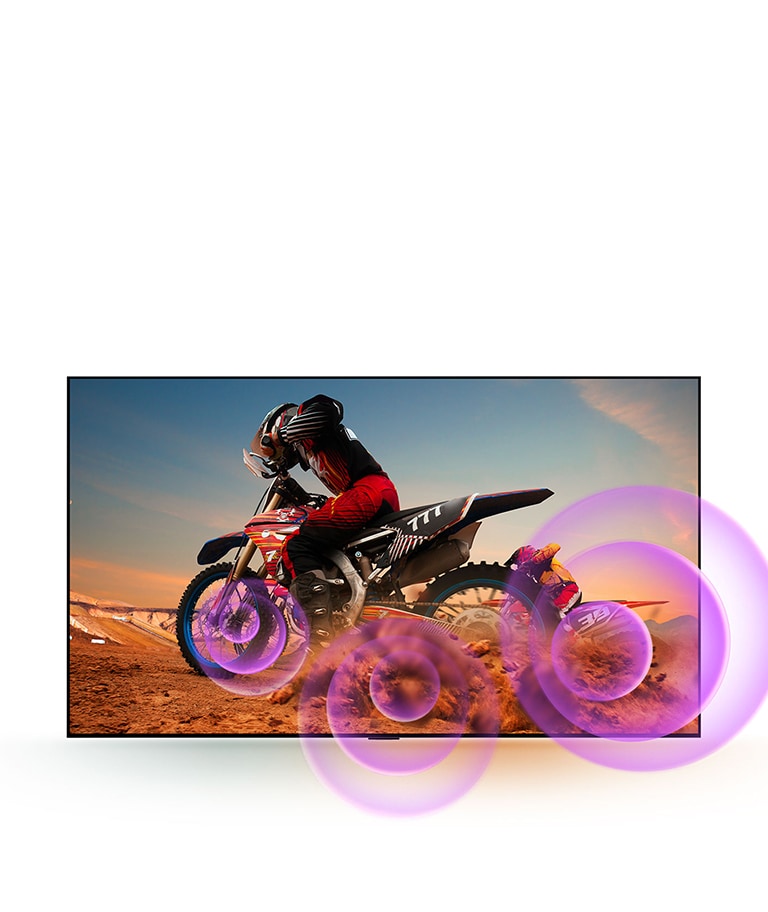 LG OLED 电视的画面显示了一位男士骑着摩托车，车轮发出紫色的抽象圆圈，以呈现声发射的样子。